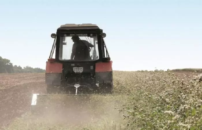 Toque o tractor.