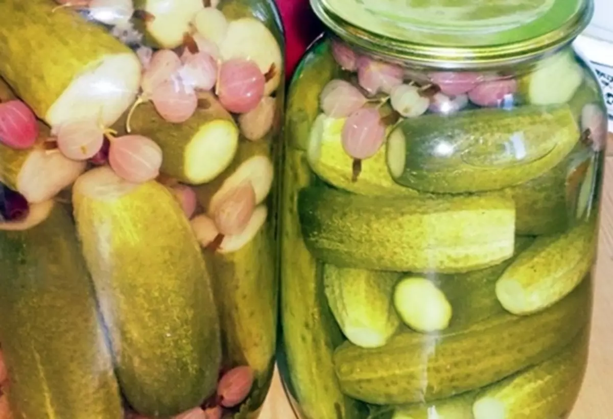 pickled cucumbers with gooseberry on the table