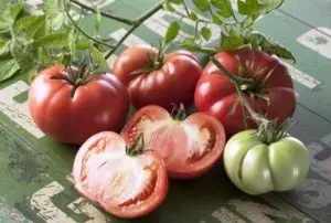 Karakteristik ak deskripsyon nan varyete nan Marlandda tomat, sede li yo