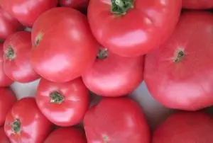 Característica e descrição de um tomate gigante de framboesa, seu rendimento
