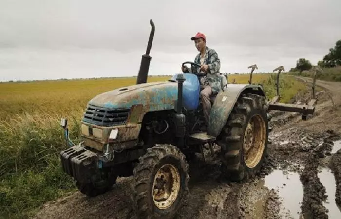 Kinesisk på en traktor