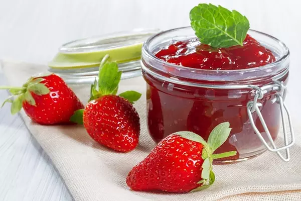Jam from strawberries in a small jar