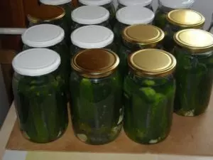 Ienfâldige komkommer-resepten mei Cinnamon foar winter sûnder sterilisaasje yn banken