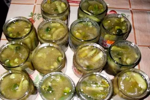Cucumbers with mustard in banks