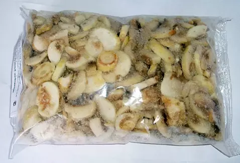 Frozen champignons in the package