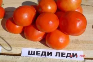 Característica e descrición das variedades de tomate de dama, o seu rendemento